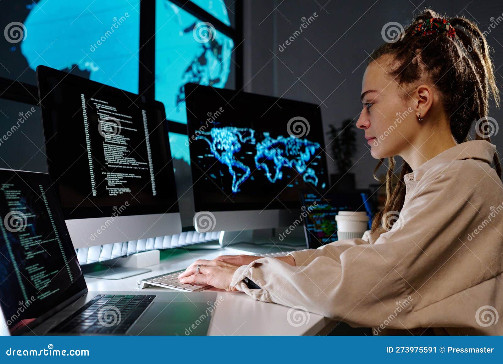 Side View of Young Programmer Developing New Software or Decoding Data ...