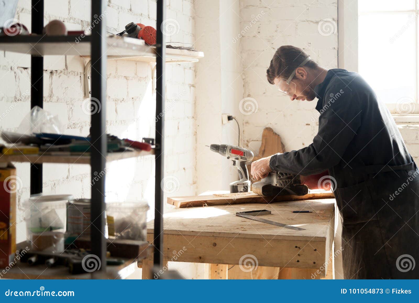 Experienced Young Carpenter Working with Wood at Joinery Worksho Stock ...