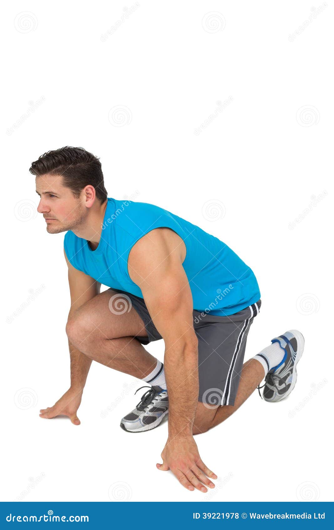 Side View of a Young Sporty Man in Running Stance Stock Photo - Image ...