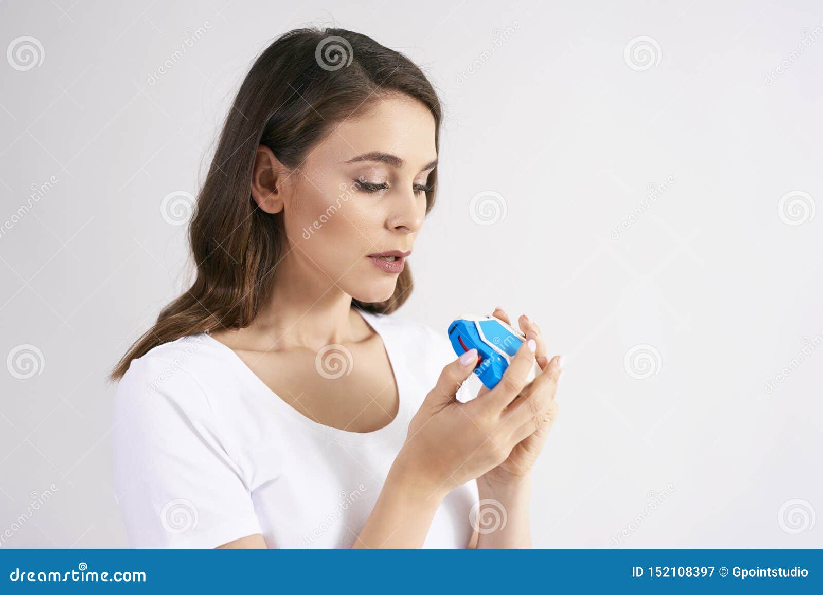 Young Woman Using an Asthma Inhaler Stock Image - Image of examine ...