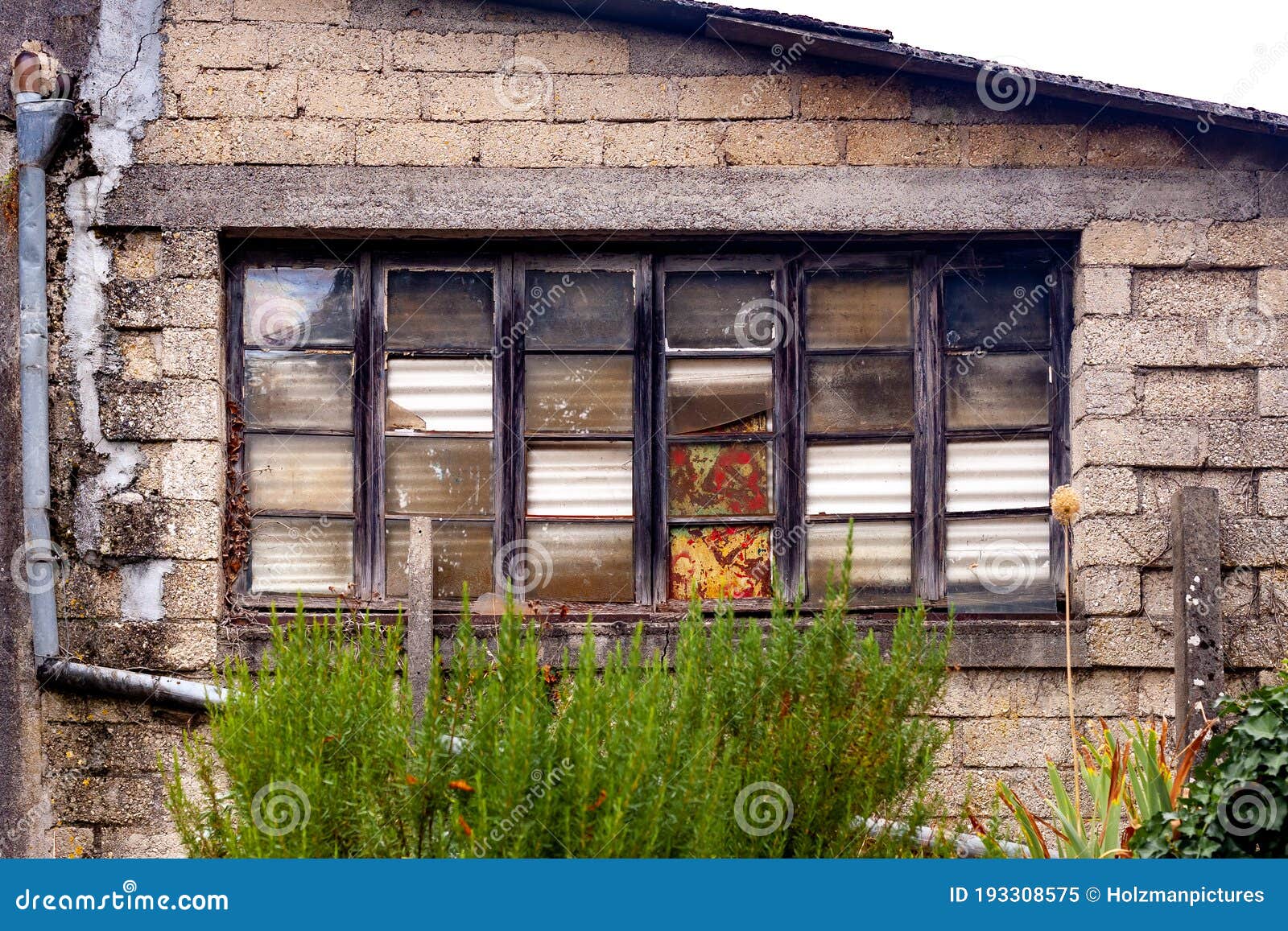 The Side Wall of a Run-down Garage Stock Image - Image of facility ...