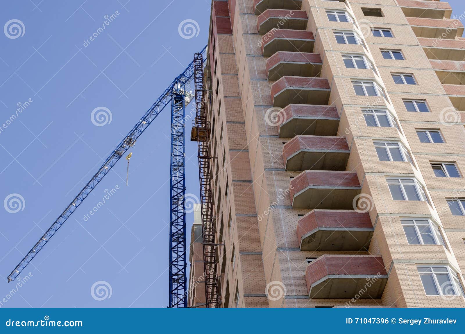 The Side Wall of the House and the Tower Crane Stock Photo - Image of ...