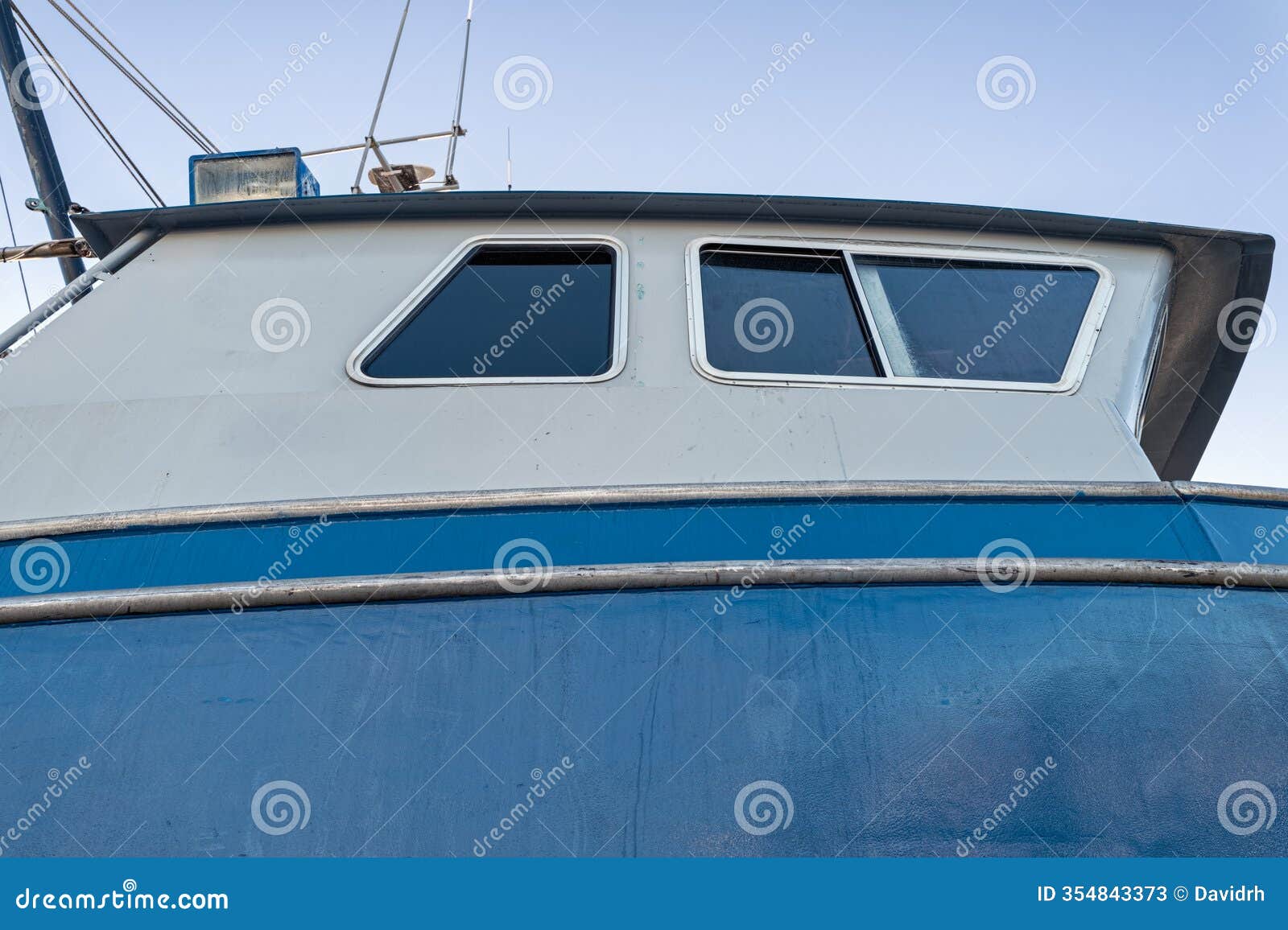 Side Windows in the Cabin of a Docked Blue Fishing Vessel Stock Image ...