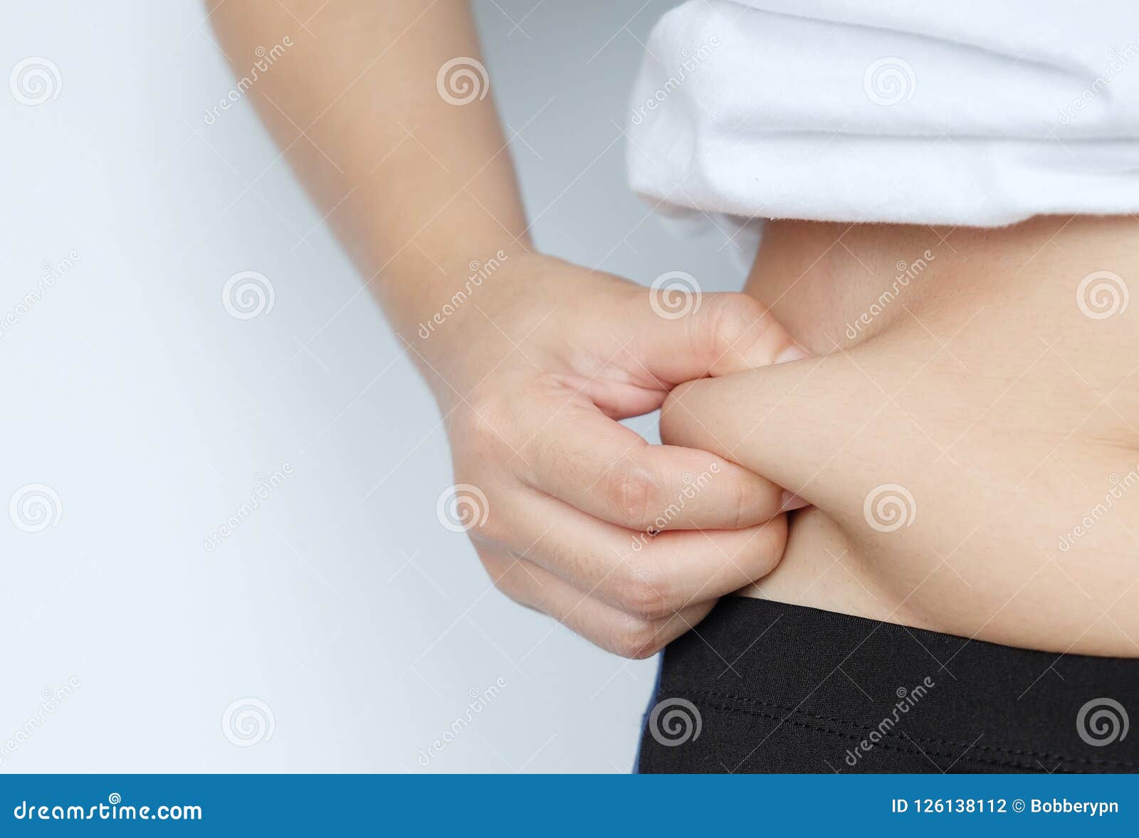 Side of Woman Hand Catching Fat Body Belly Paunch , Diabetic Risk ...