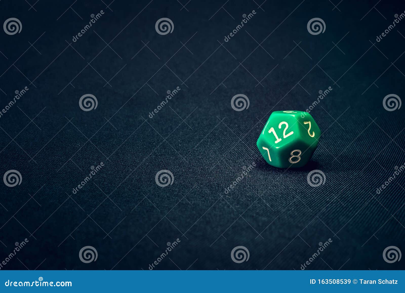 12 Sided Green Die for a Game on a Background Stock Image - Image of ...