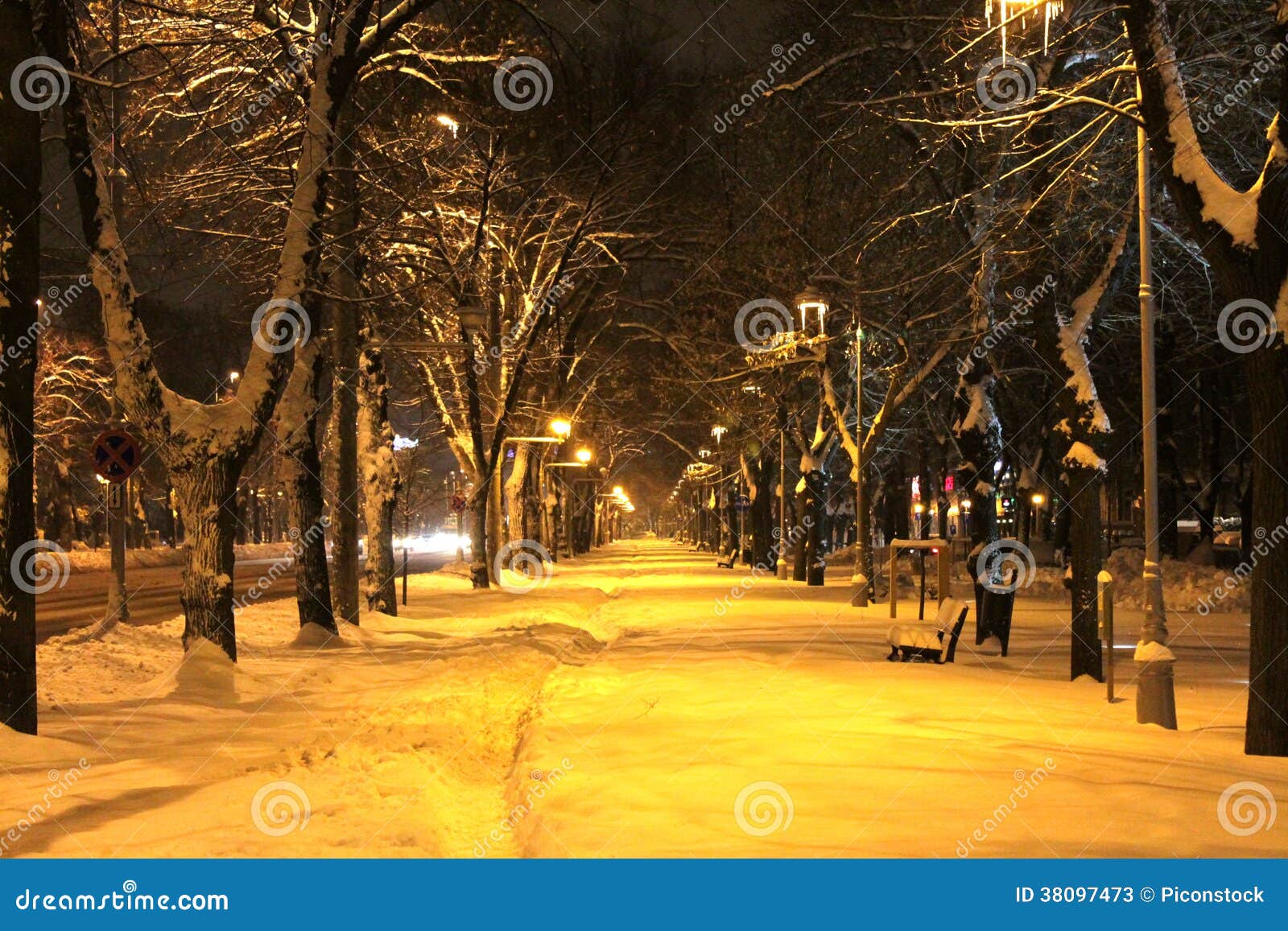 Sidewalk covered with snow stock image. Image of benches - 38097473