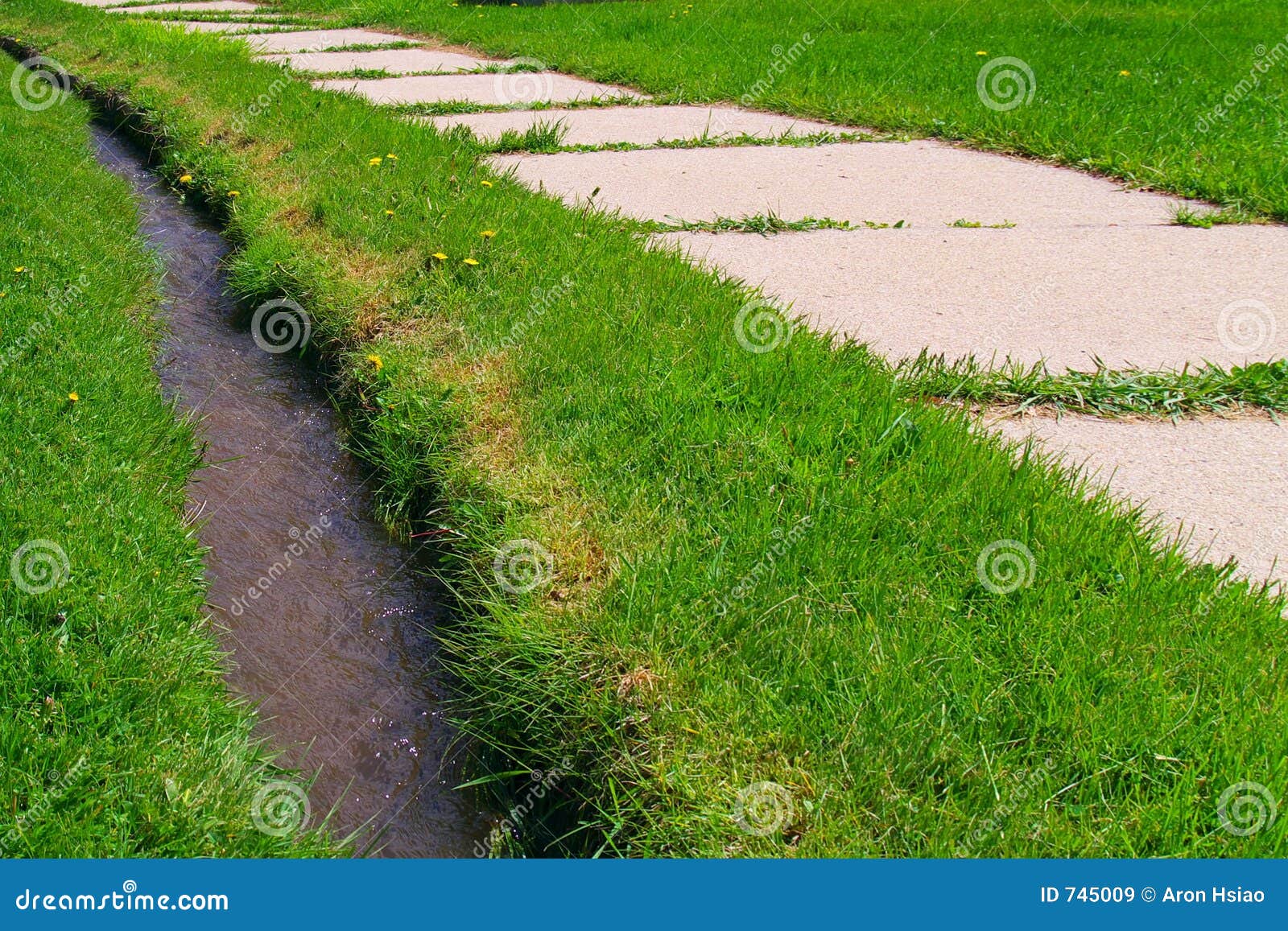 Sidewalk and Ditch in Grass Stock Image - Image of summer, concrete: 745009