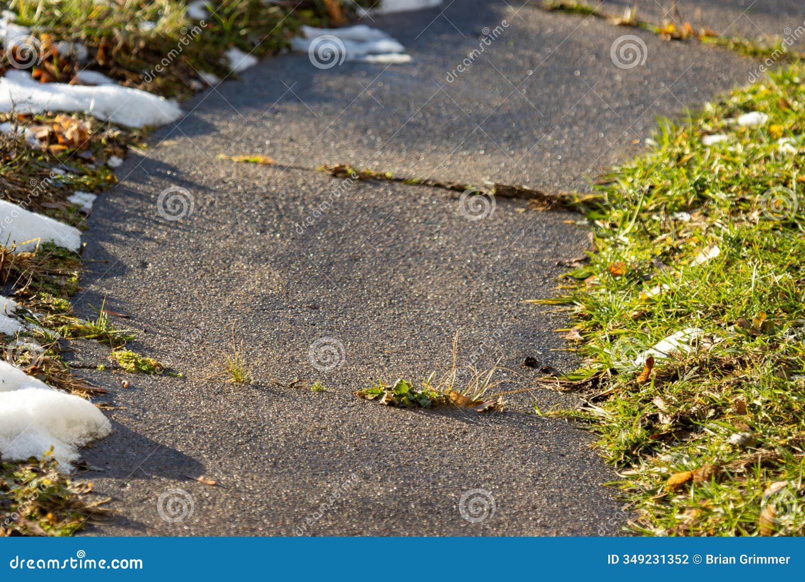 A Sidewalk in the Sun with Melting Snow Stock Photo - Image of yard ...
