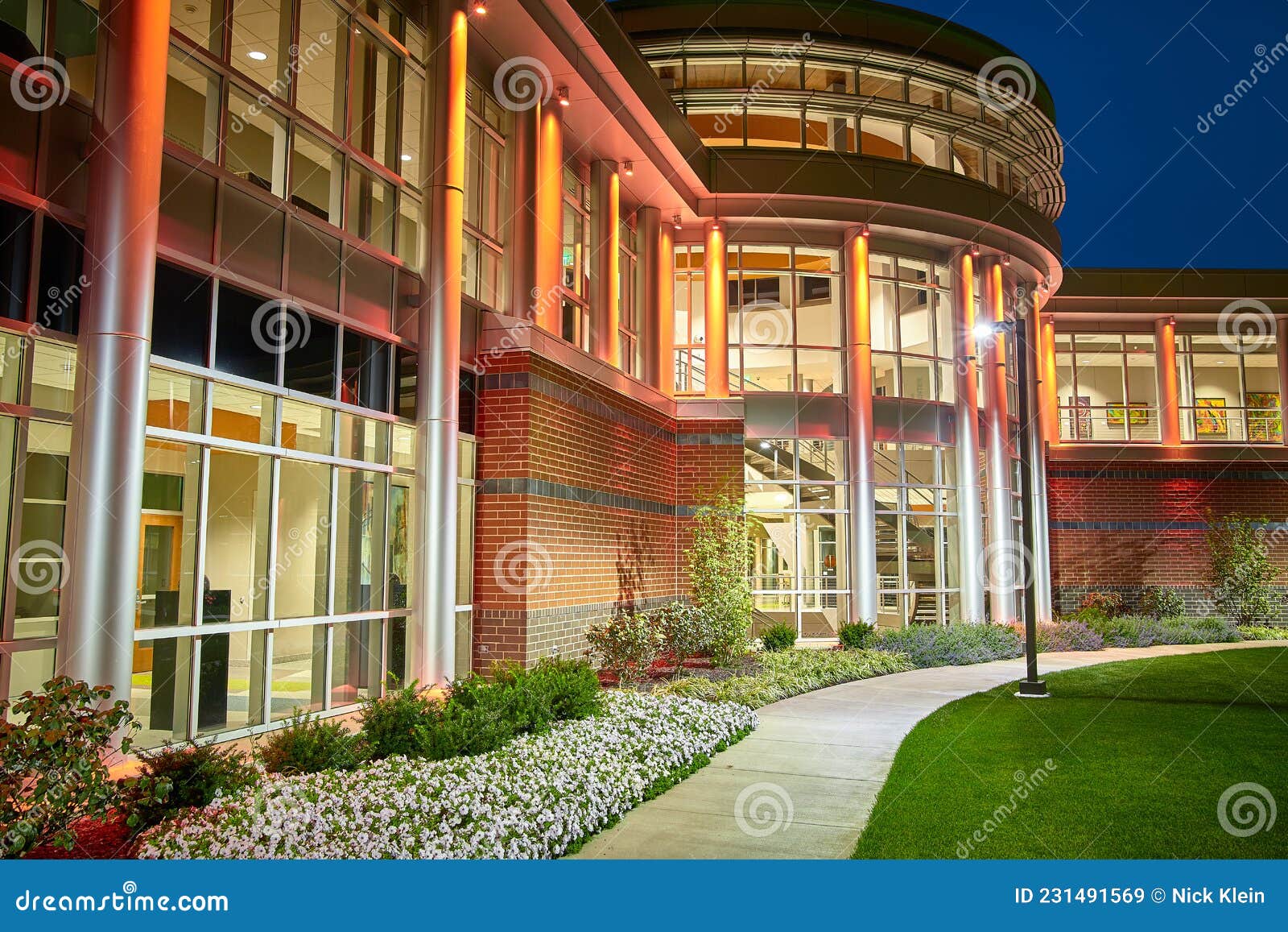 Sidewalk Leading To the Front Door of a Dormitory with Lots of Windows ...