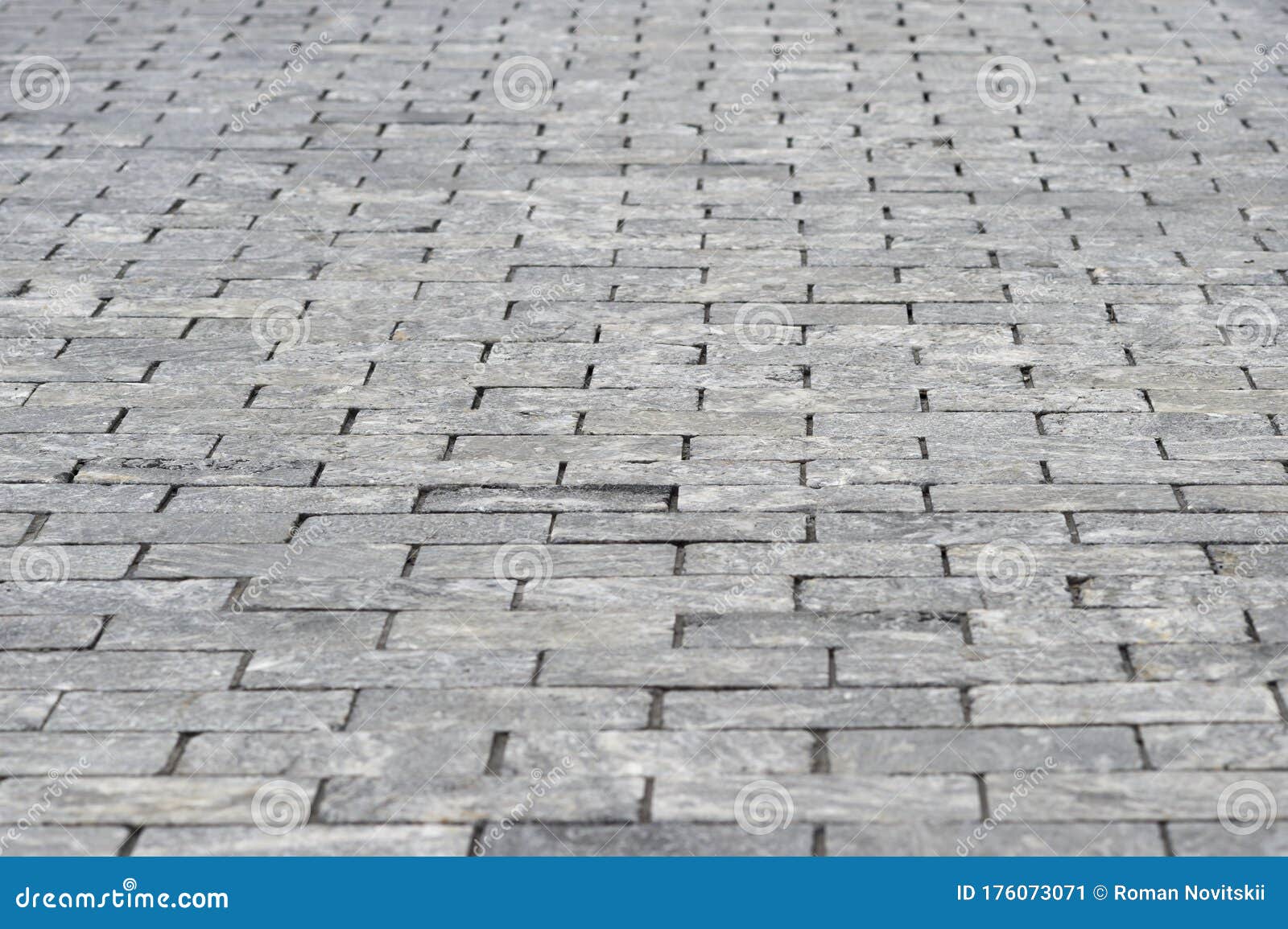 The Sidewalk is Made of Rectangular Gray Granite Bricks . Background ...