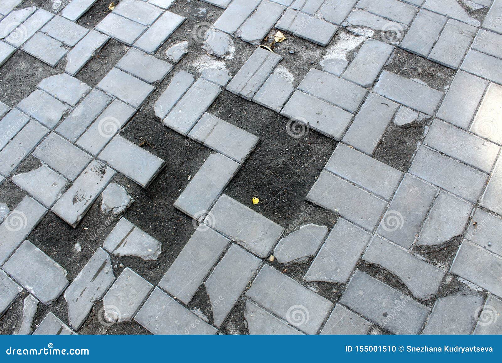 The Sidewalk Made of Tiles Collapsed, Parts of the Tile Fell Out. Stock ...