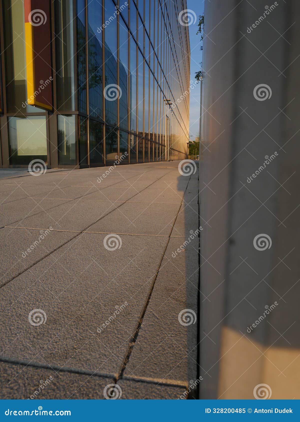 A Sidewalk Next To an Office Building Made of Glass Editorial Image ...