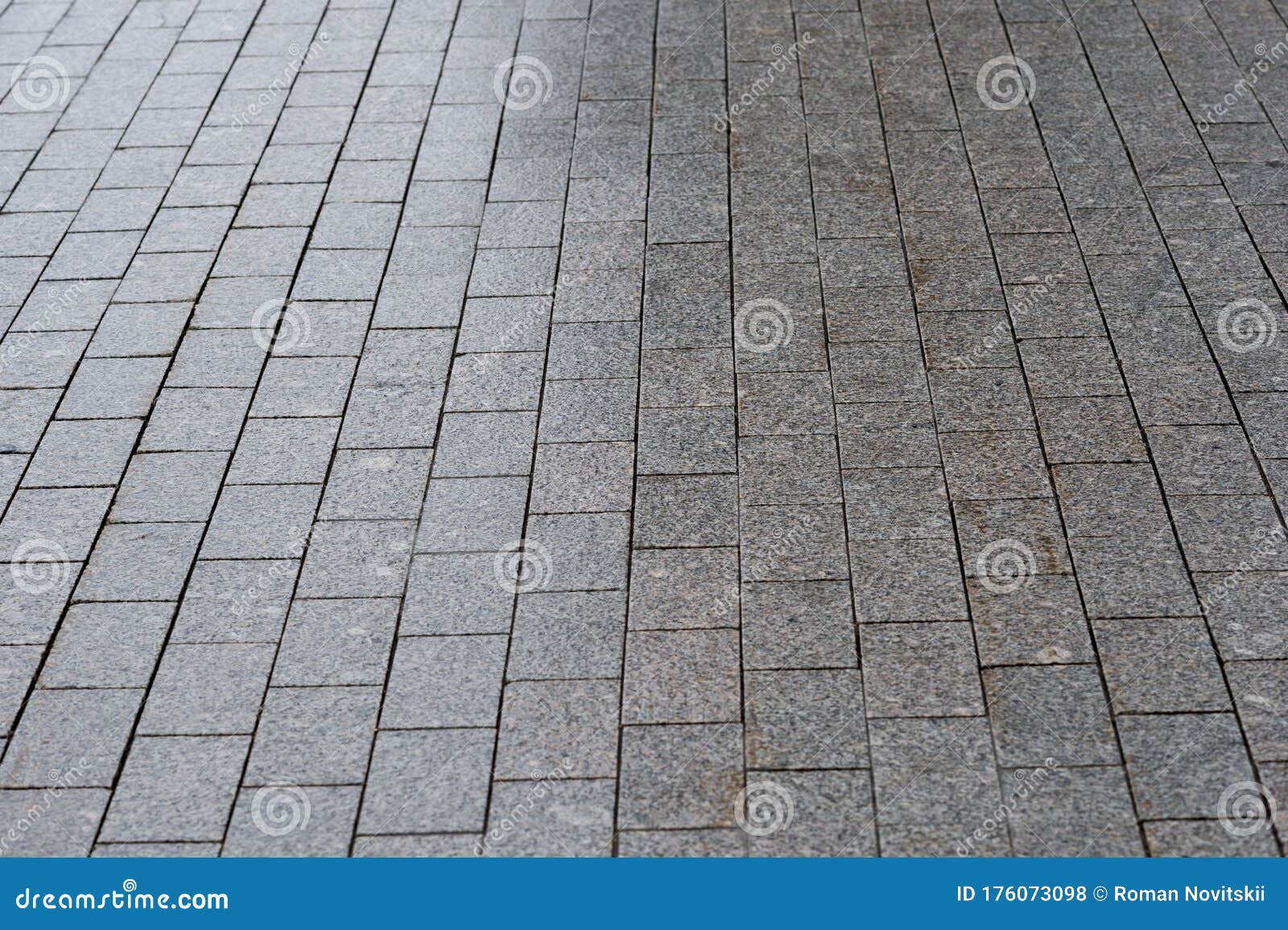 The Sidewalk is Paved with Granite with Uneven Lighting Gradient ...