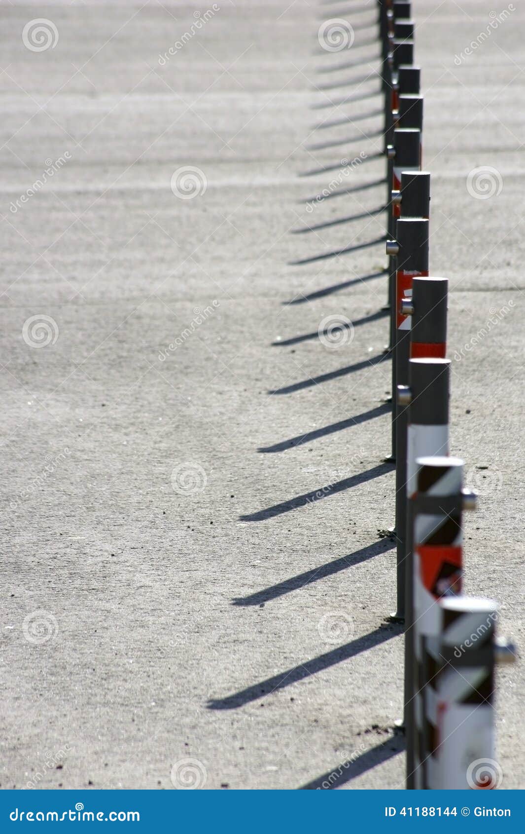 Sidewalk post with shadow stock photo. Image of fencing - 41188144