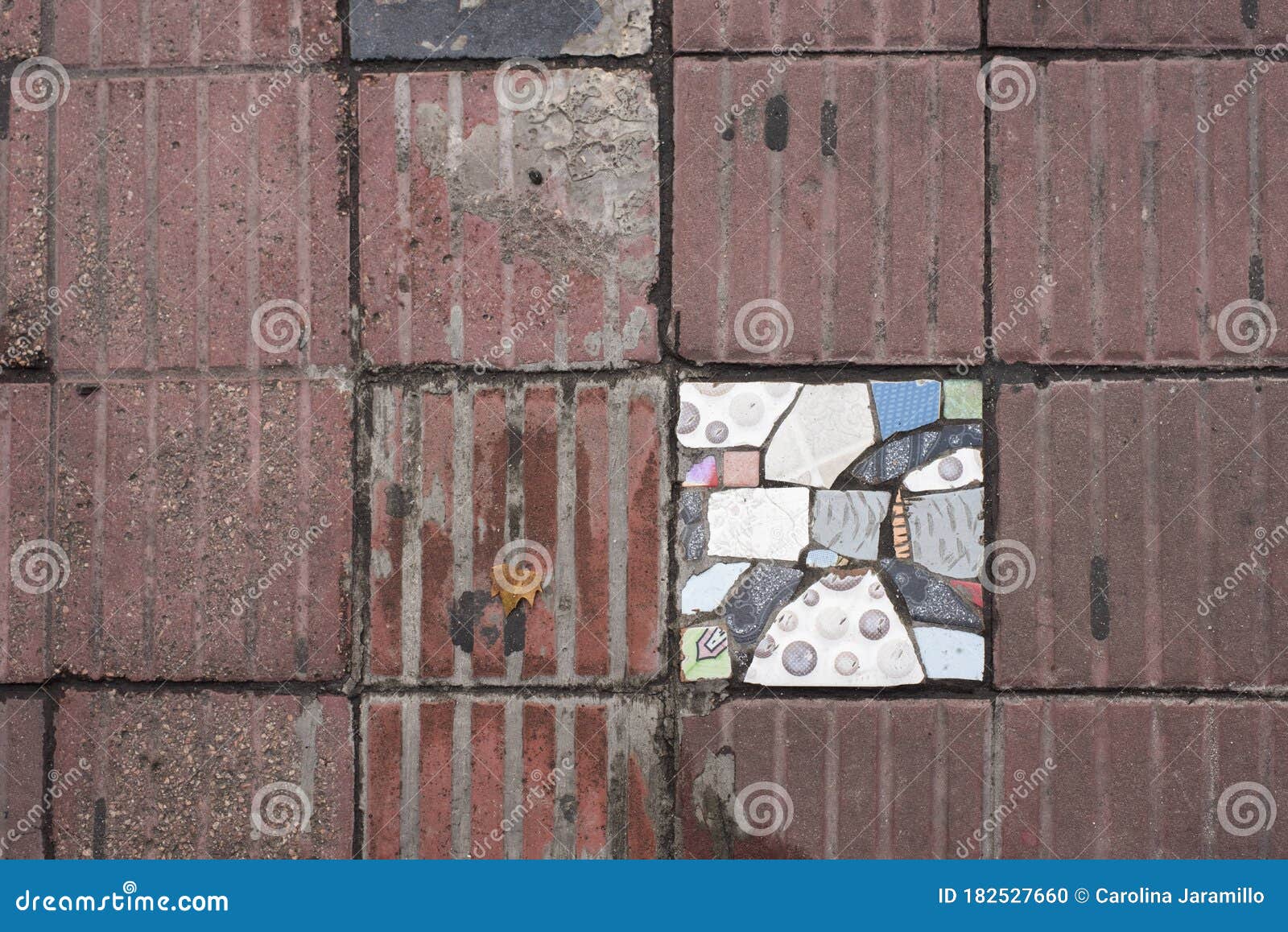 Sidewalk Tile Replaced by Broken Pieces of Different Colored Tiles ...