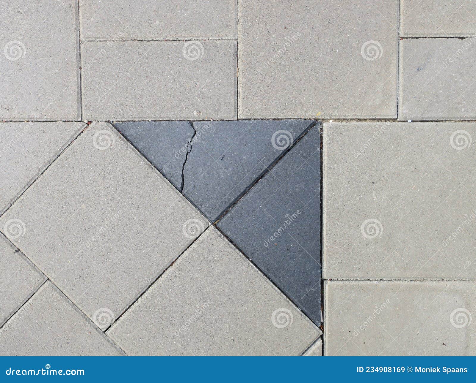 Sidewalk with Two Black Triangles, One Broken Stock Image - Image of ...