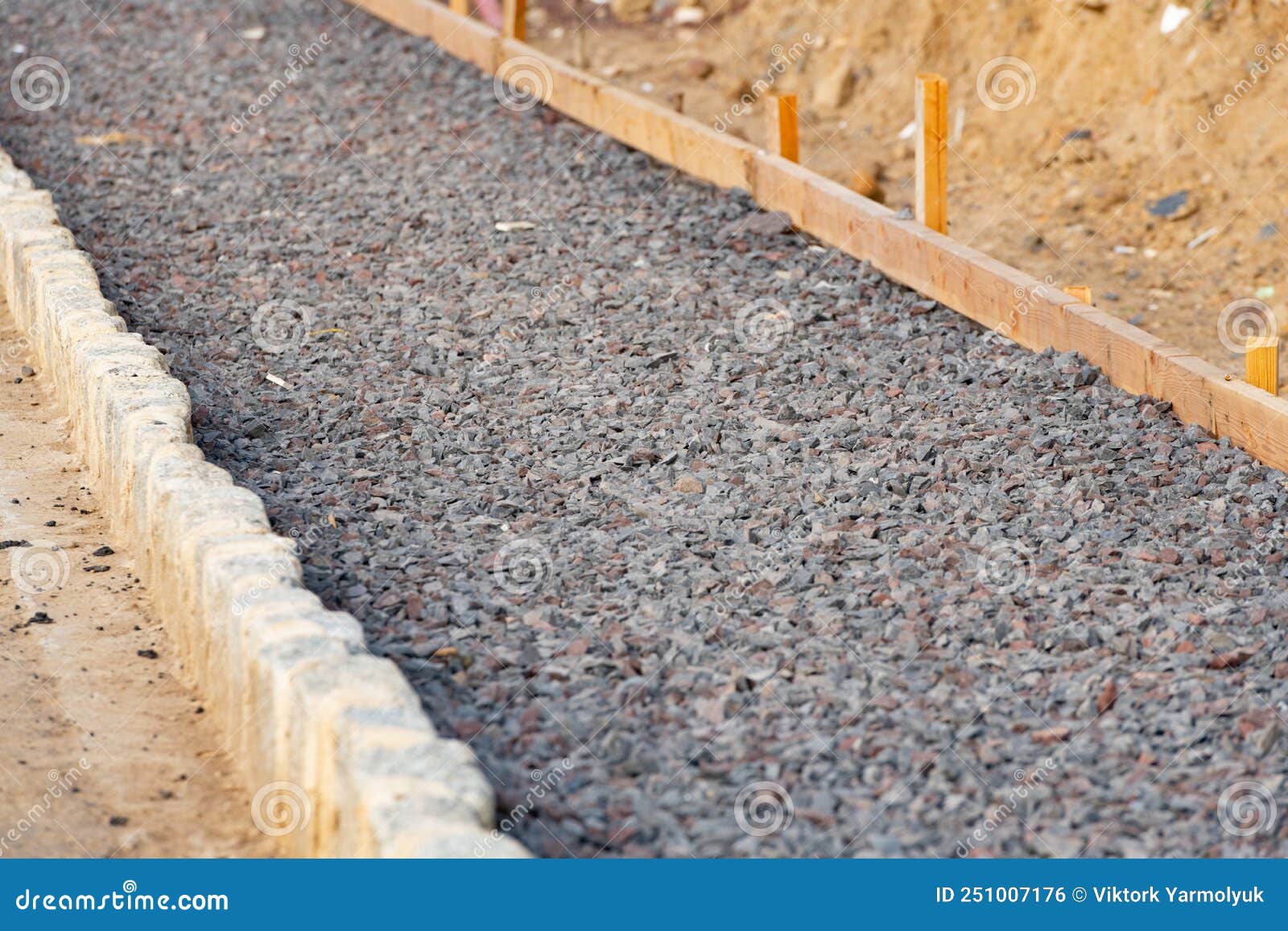 A Sidewalk is Under Construction, a Concrete Curb is Being Installed ...