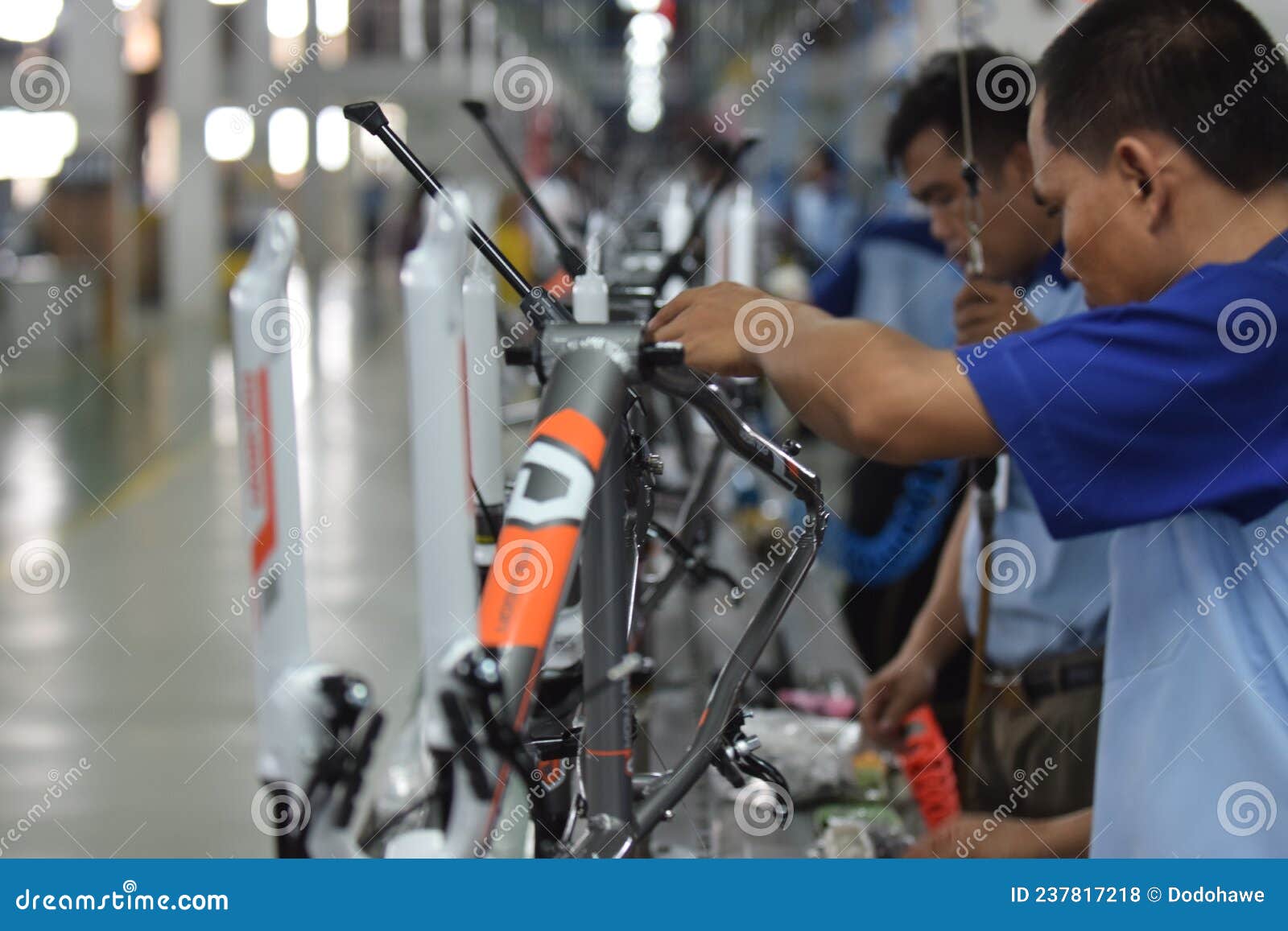 Workers Check on the Assembly Line at the Assembly Bicycle Bike ...