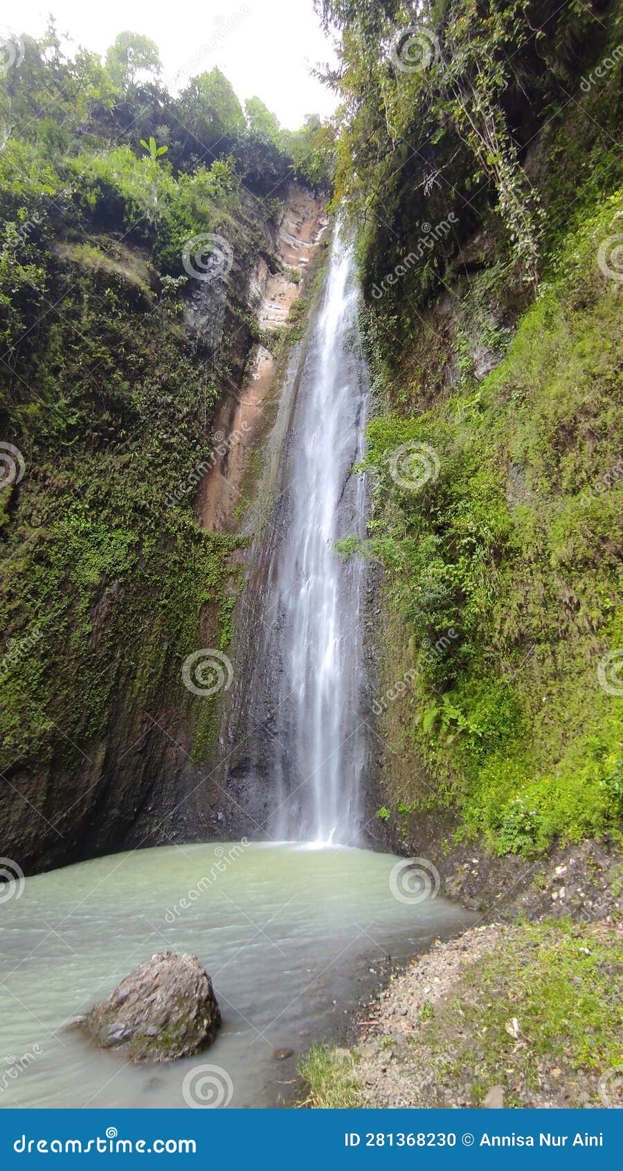 The Sidoharjo Waterfall in Kulon Progo, Yogyakarta Stock Photo - Image ...