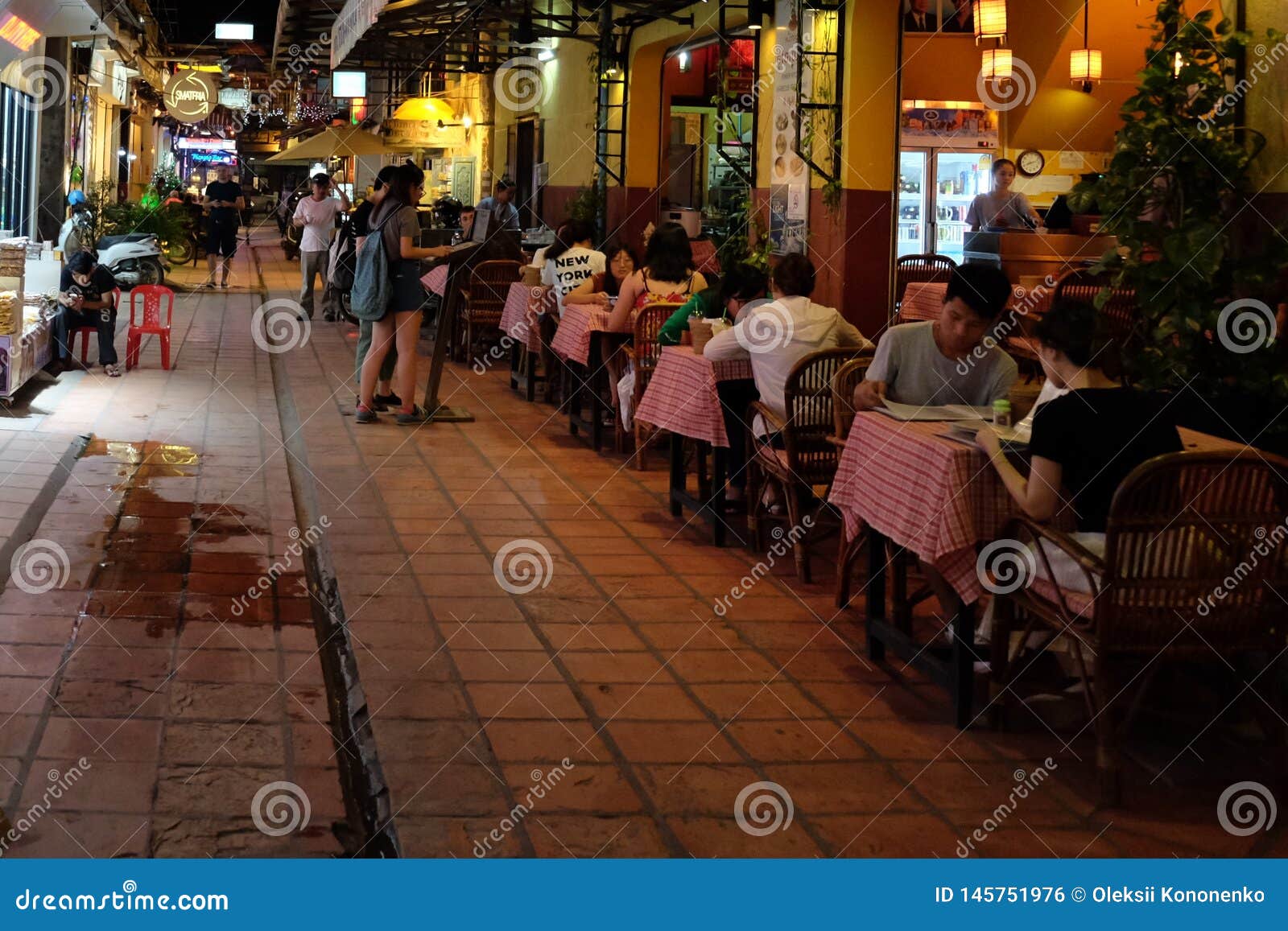 People Eat Dinner at a Cafe Outside, Night Time Editorial Photo - Image ... People Eat Dinner at a Cafe Outside, Night Time Editorial Photo - Image ...