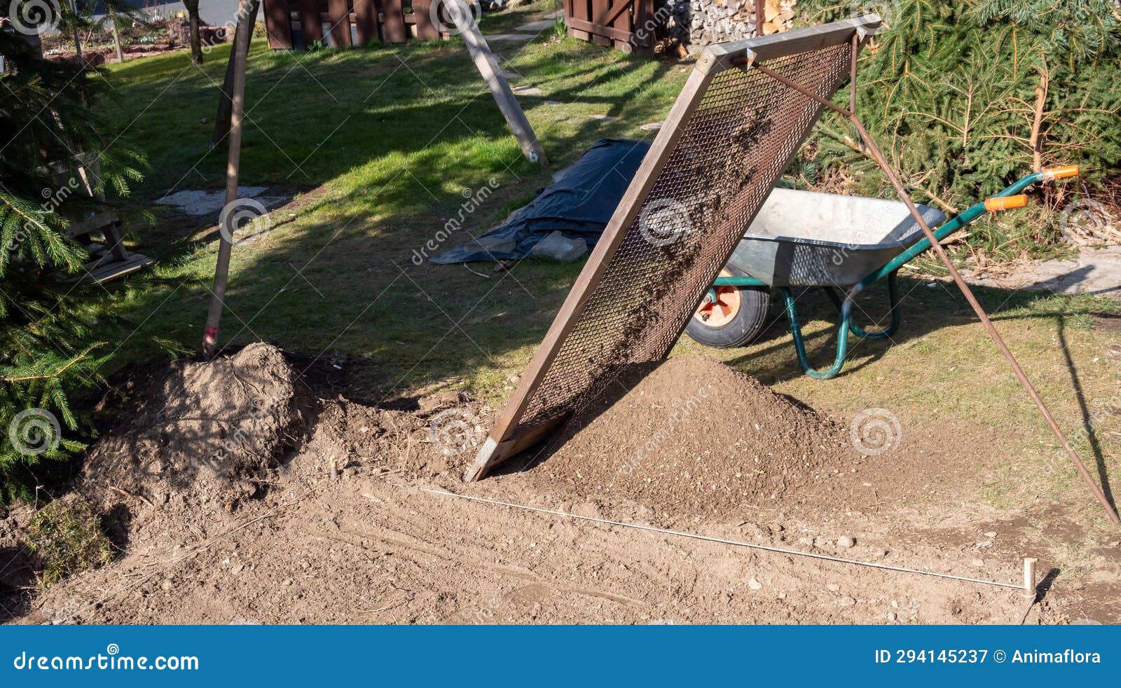 Sieve Garden Soil into a Compost Heap Stock Image - Image of humus ...