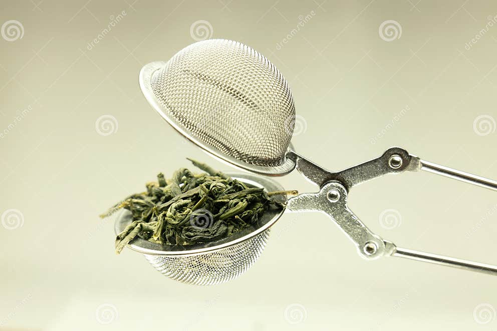 Sieve with Large Leaf Green Tea on a White Background Stock Photo ...