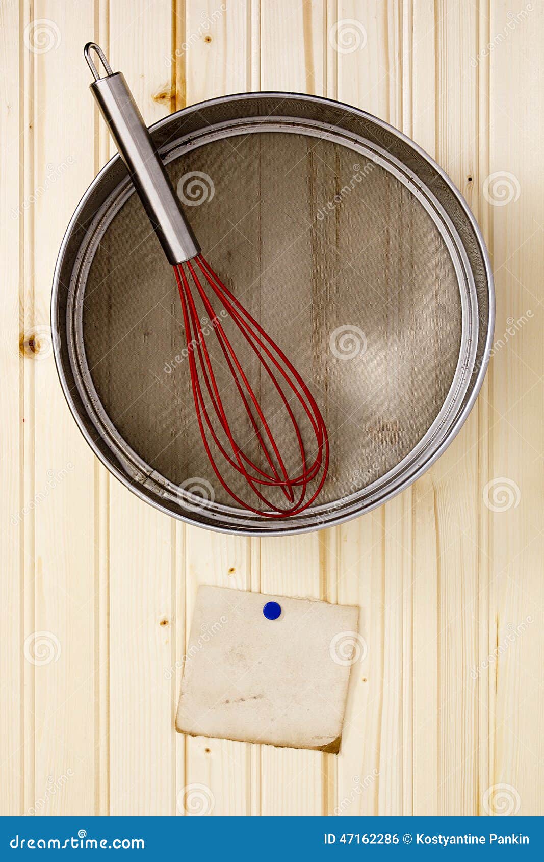 Sieve on a wooden wall stock photo. Image of paper, metalic - 47162286