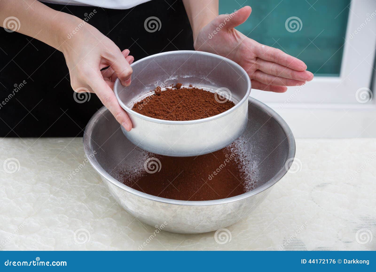 Sifting cocoa powder stock photo. Image of preparation - 44172176