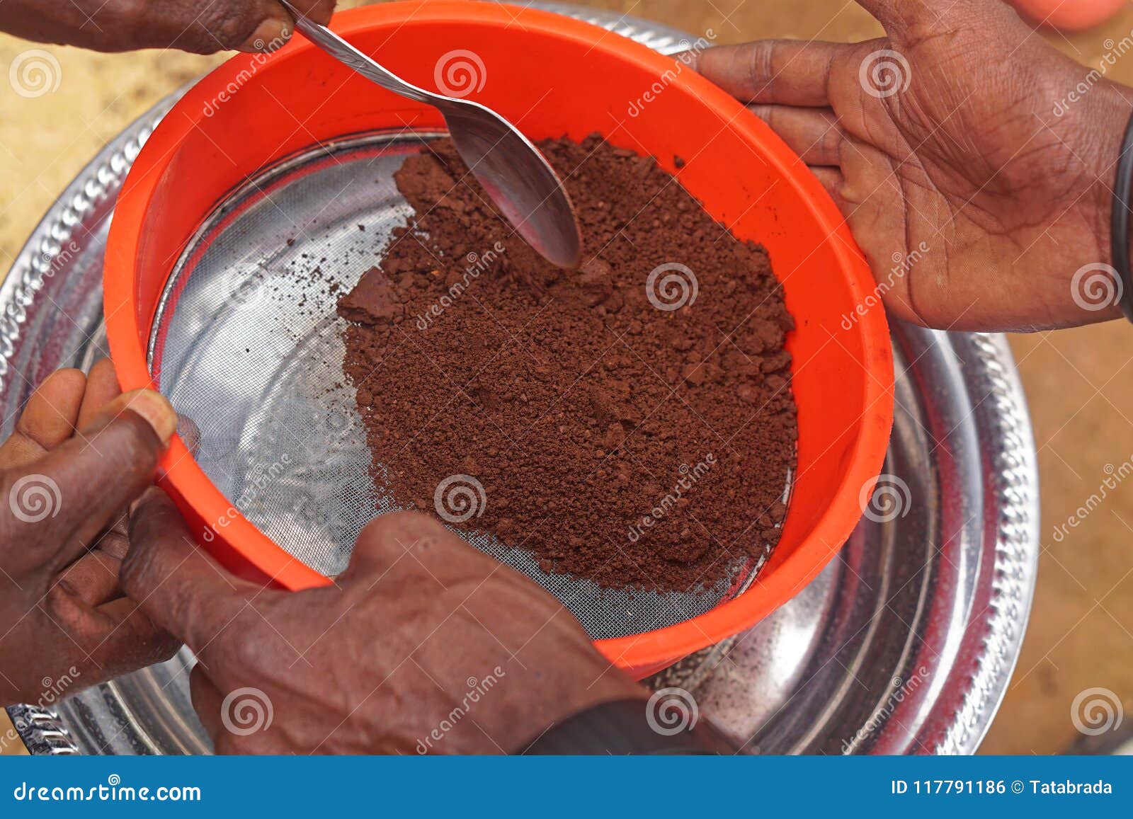 Sifting coffee stock photo. Image of holding, coffee - 117791186