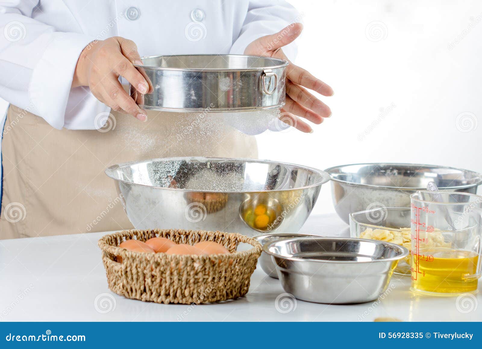 Sifting flour stock image. Image of mixing, preparation - 56928335