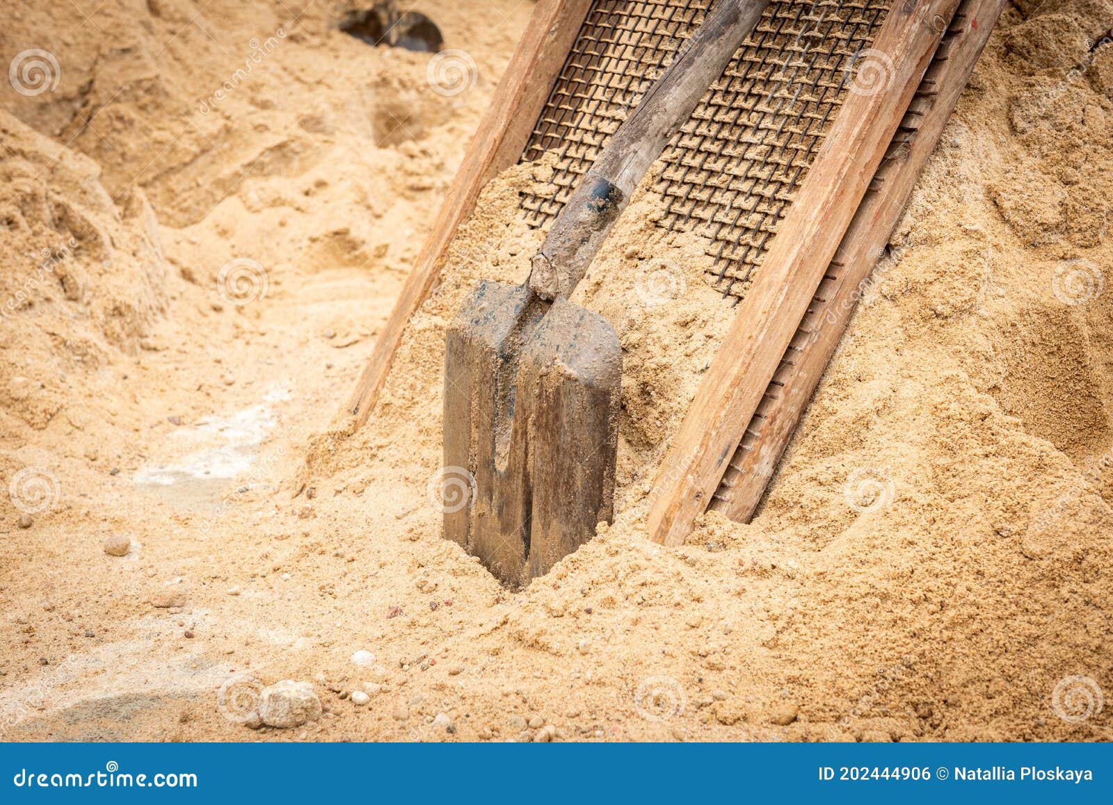Sifting Sand through a Grid at a Construction Site Stock Photo - Image ...