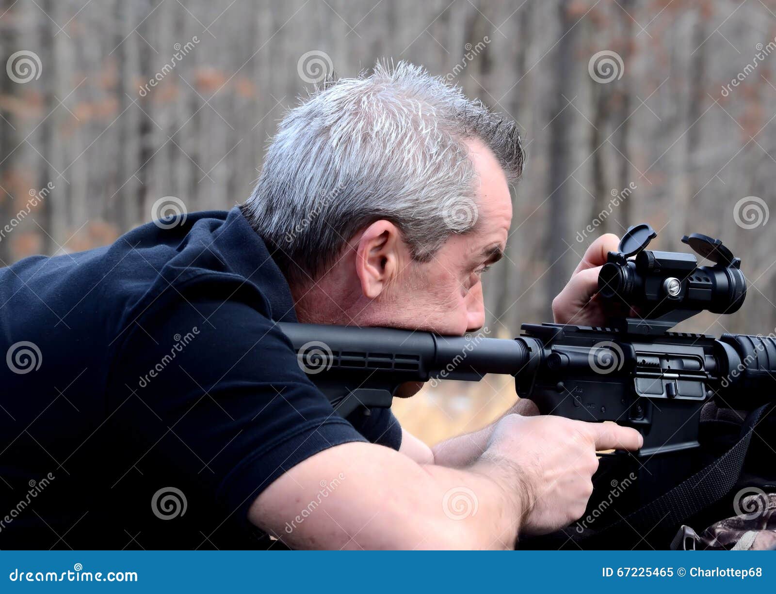 Sighting his gun stock image. Image of zeroing, shooter - 67225465