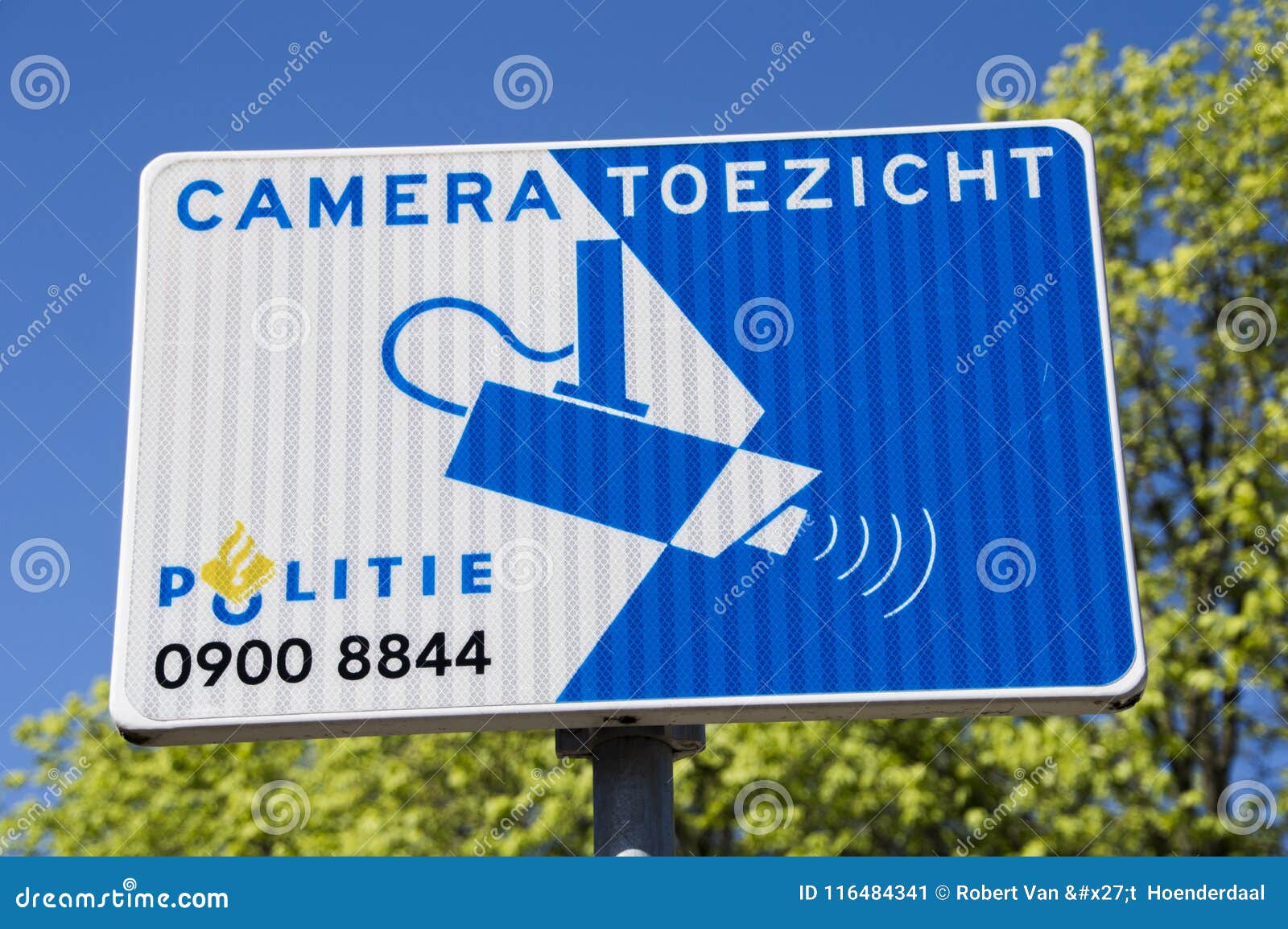 Police Camera Speed Trap Van At The Side Of The Road While A Car Speeds ...