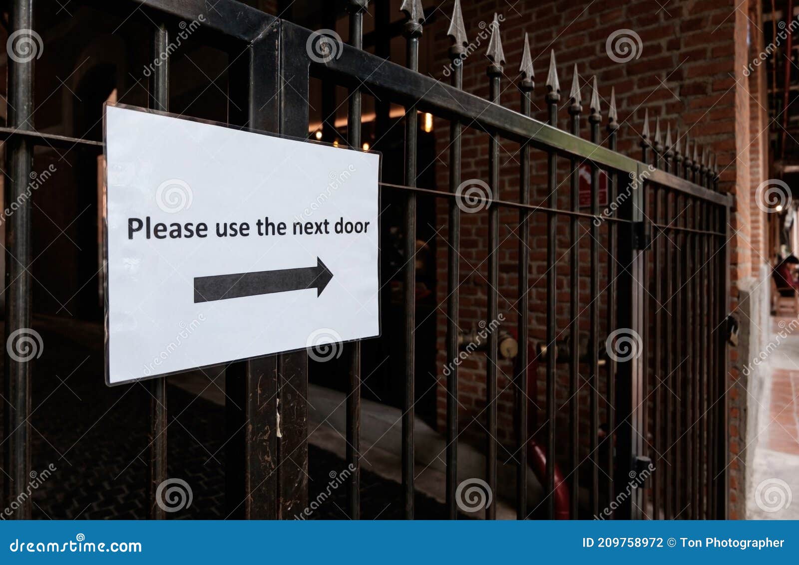 Sign Board Please Use the Next Door Stock Photo - Image of banner, mock ...