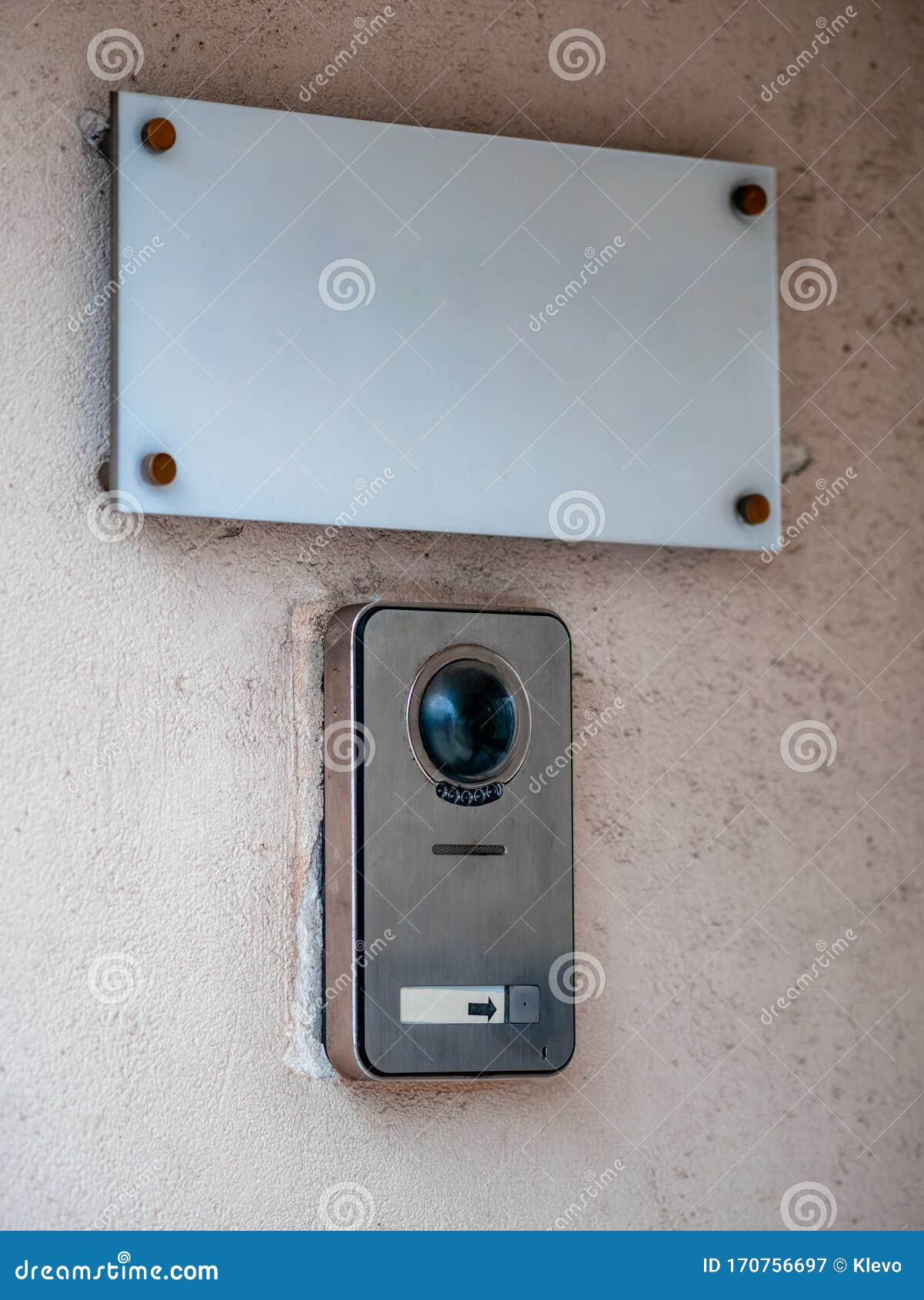 A Sign Board on Wall of the Building and a Call Button for Staff. White ...