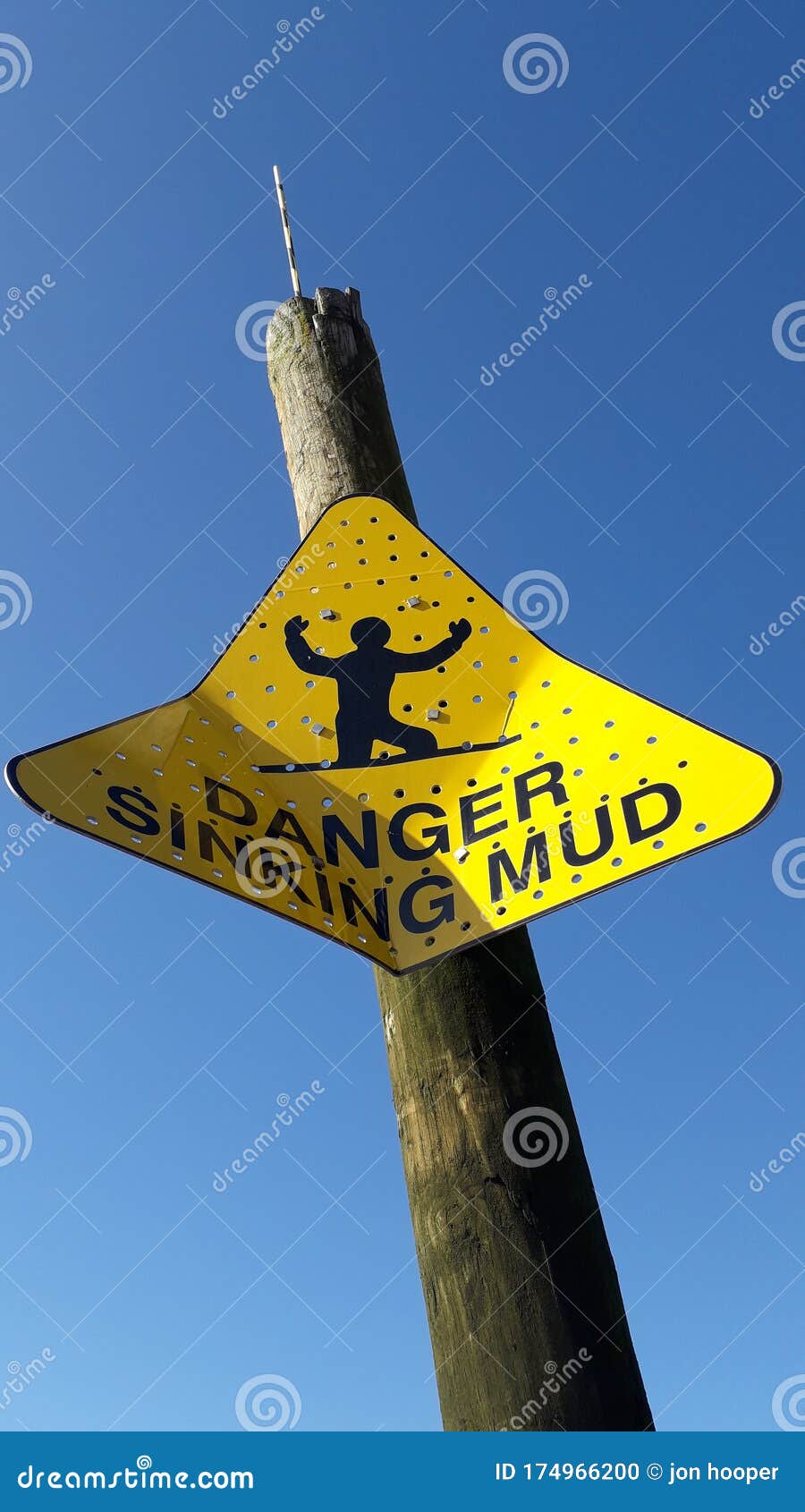 Sign Caution Sinking Sand Tower Stock Photo - Image of sign, sand ...