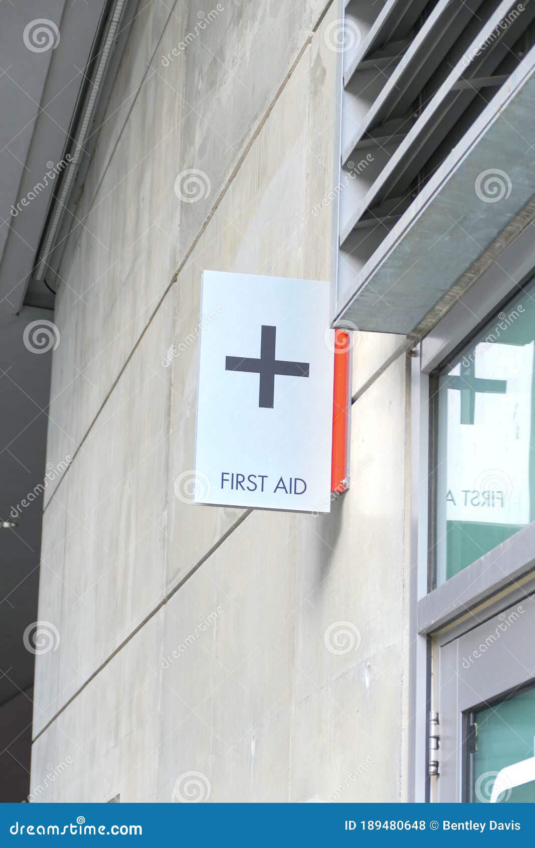 First Aid Sign on Building Facade Stock Photo - Image of outdoor ...