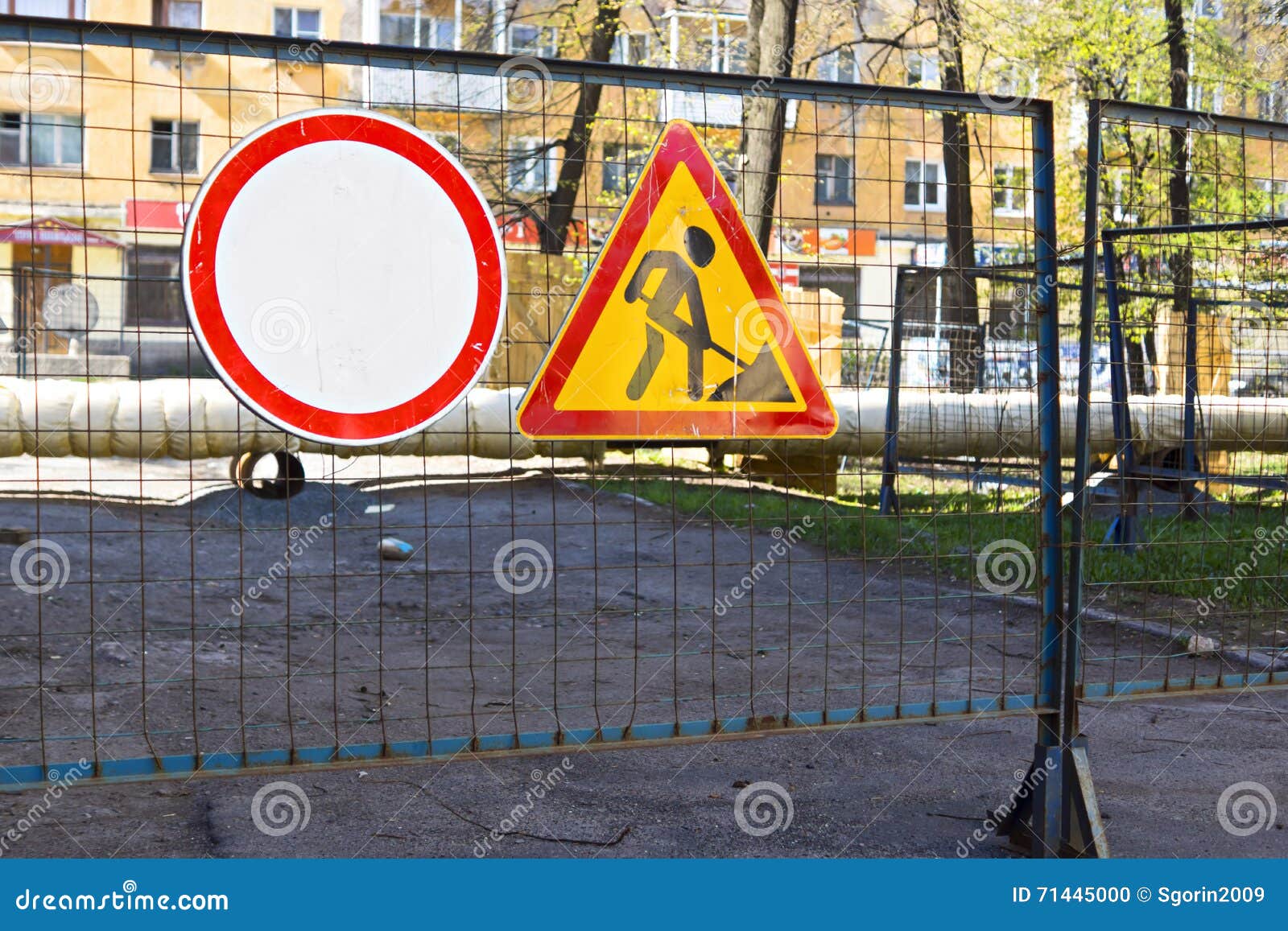 Sign of Construction Works in Yard Stock Photo - Image of pipes, road ...