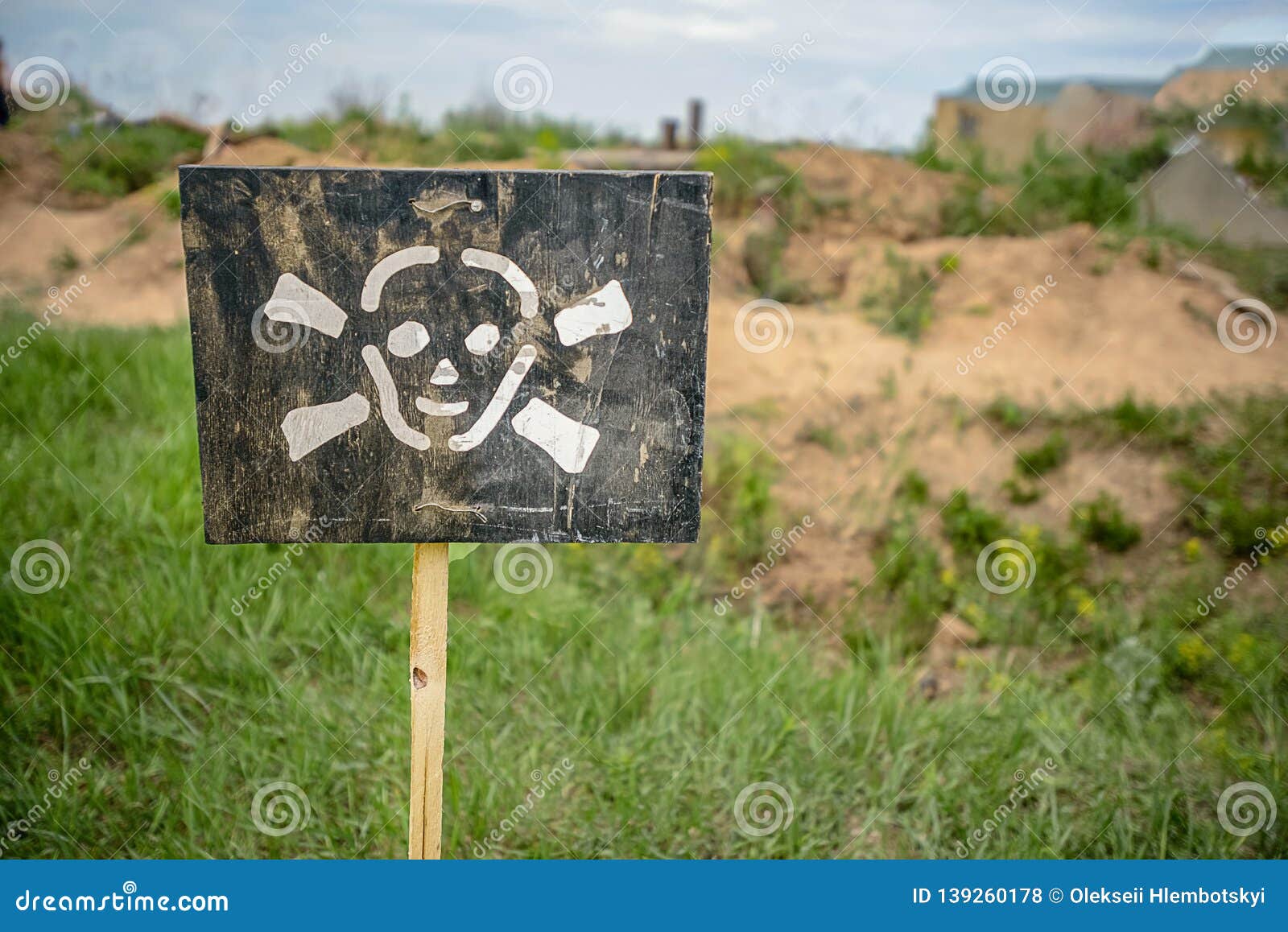 Sign of Danger Announcing about Mined Fields in Front of Green Gras ...