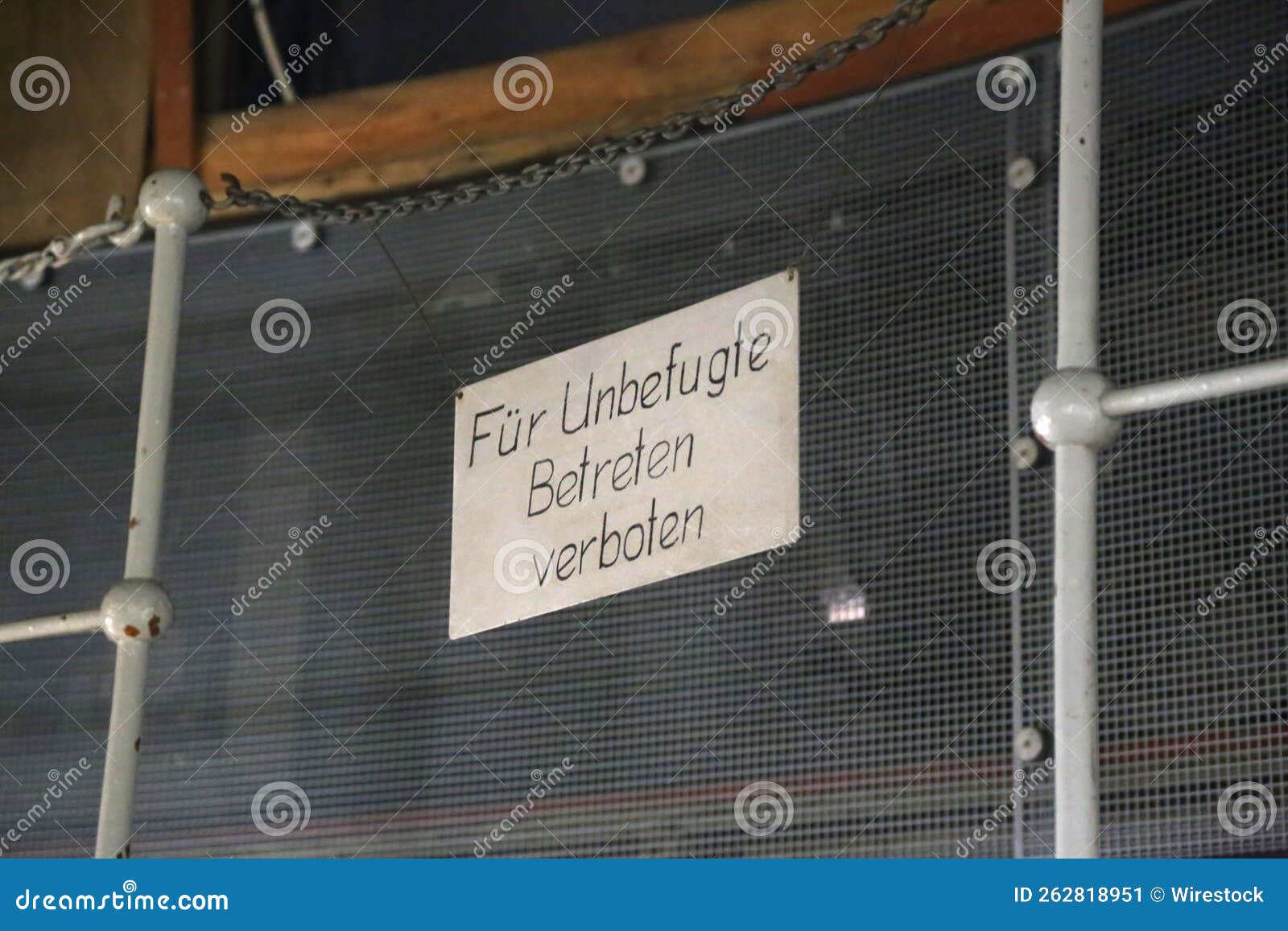 Sign in German Fixed on a Metal Surface. Translation: Entry Prohibited ...