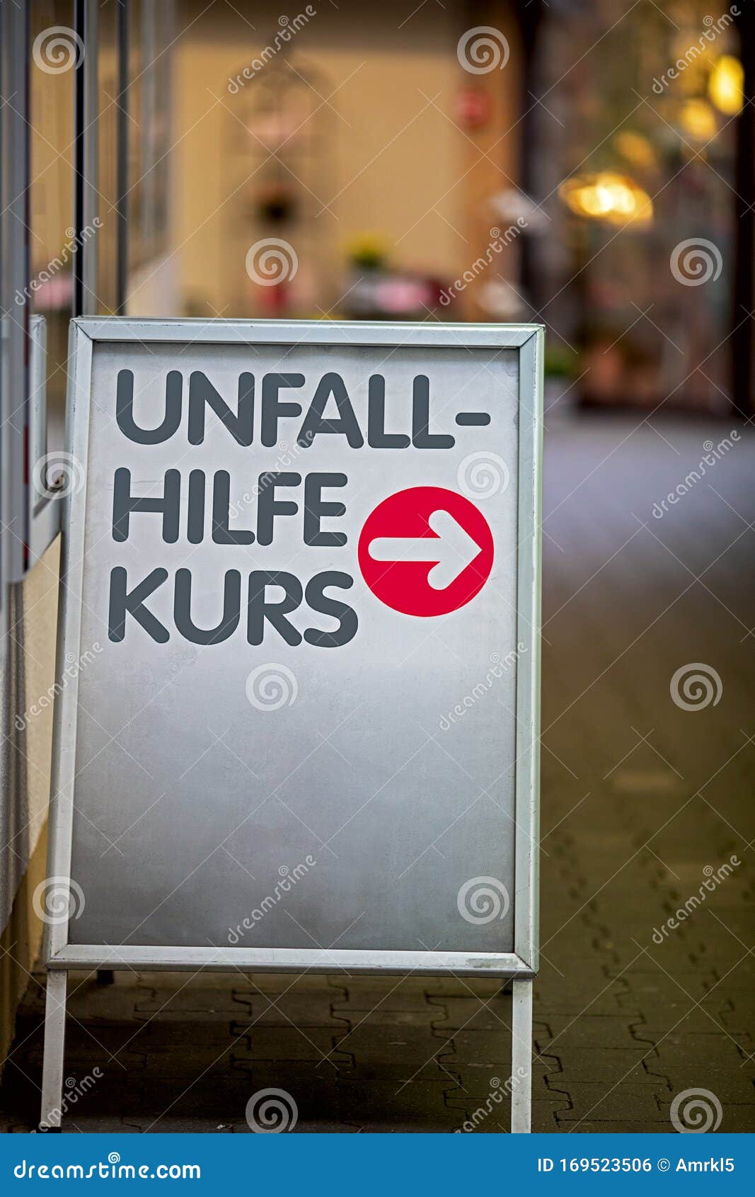 Sign with Guide To the First Aid Class, Text in German Language Unfall ...