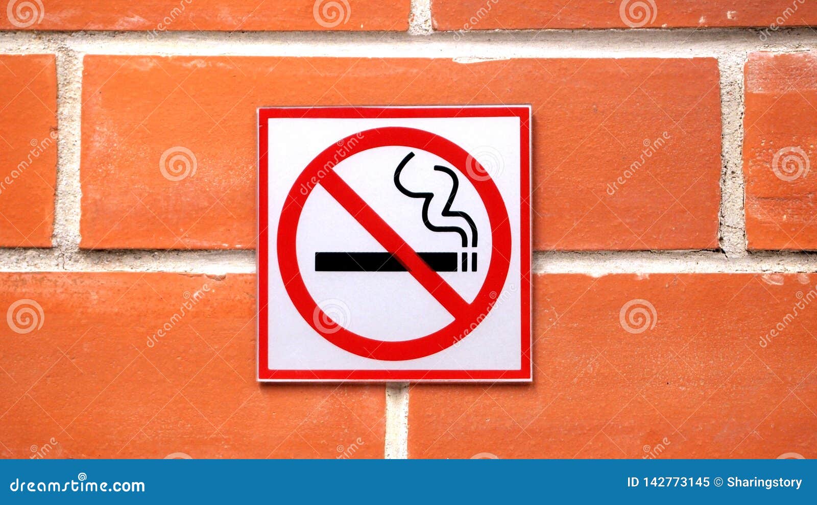 Sign Hangs on a Brick Wall Warning that Smoking is Not Permitted in the ...