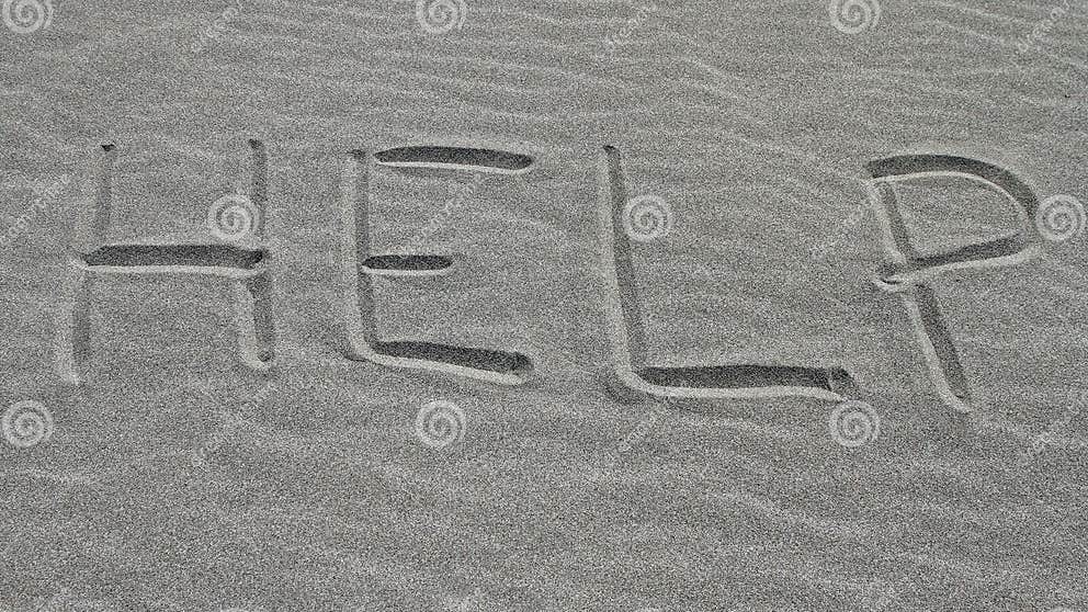Sign Help in Sand stock image. Image of quartz, sand - 290825337