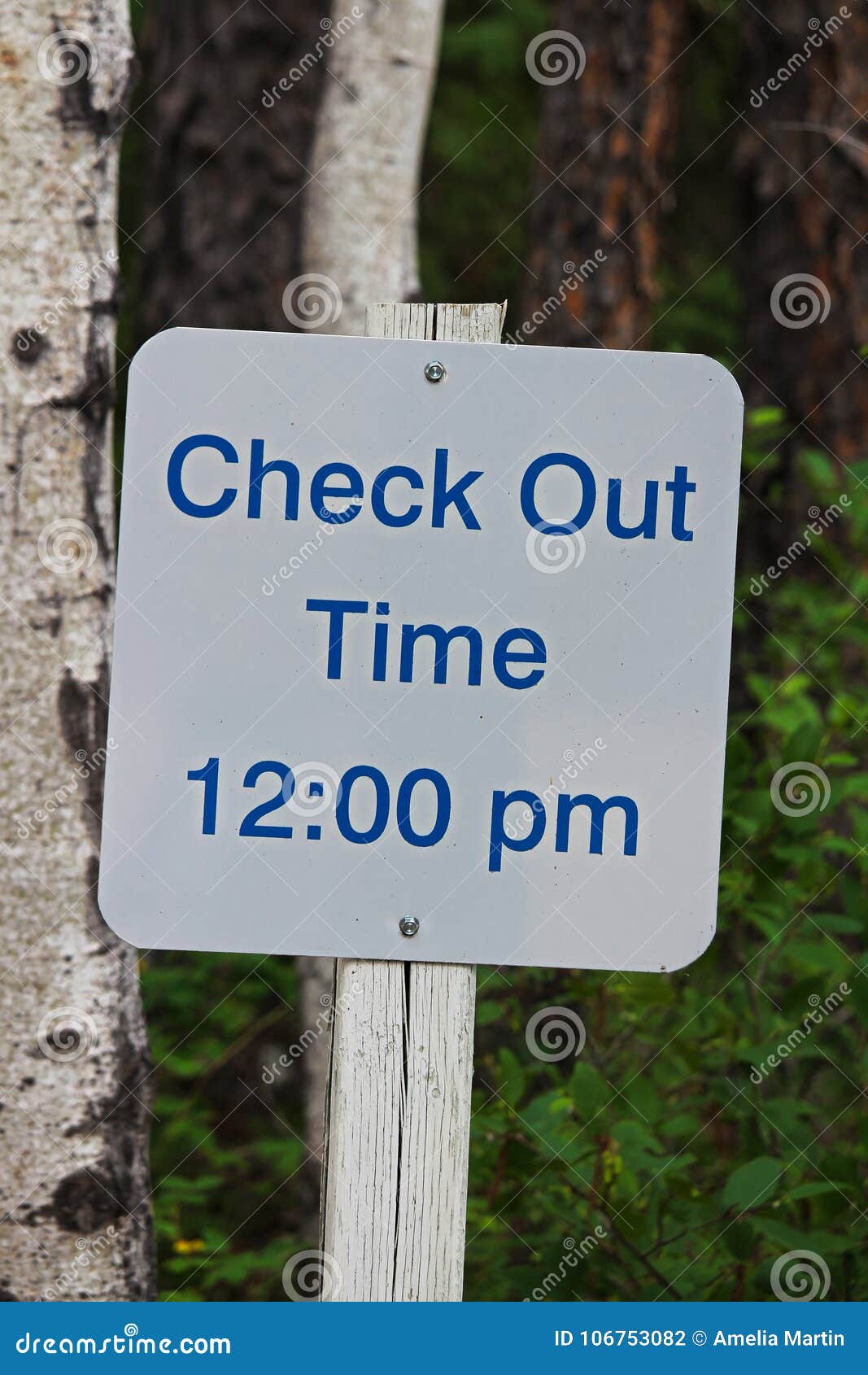A Sign Indication Check-out Time is 12:00 Pm Stock Photo - Image of ...