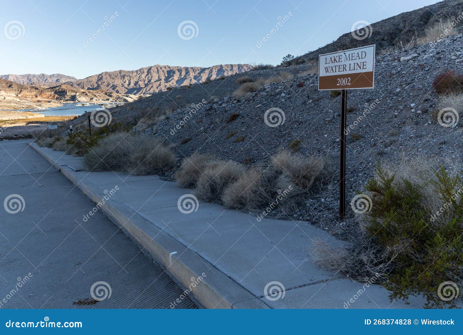 Sign of the Lake Mead Waterline by the Road Stock Photo - Image of lake ...