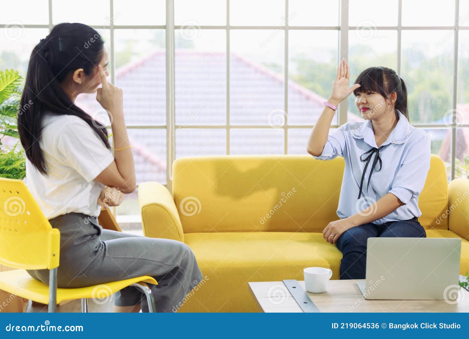 The Sign Language Instructor Teaching a Beautiful Woman To Learn Deaf ...