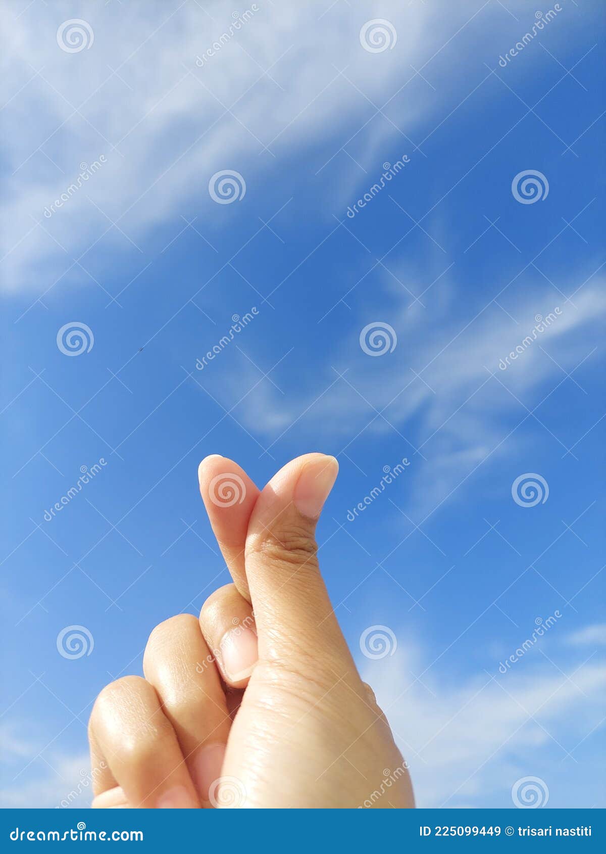 A Sign of Love by Hand in the Blue Sky Stock Image - Image of blue ...