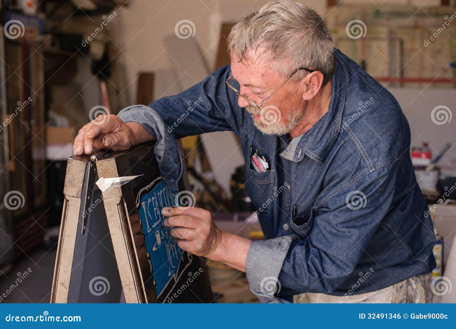 Sign painter working stock photo. Image of working, sign - 32491346