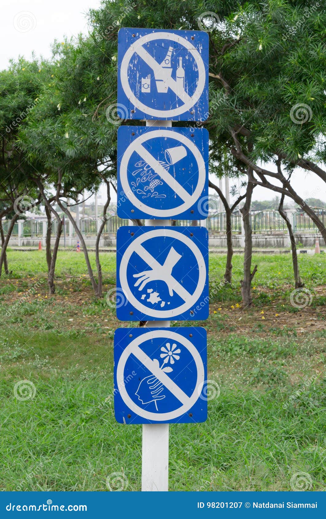 Sign in the park stock image. Image of bottle, tree, plant - 98201207