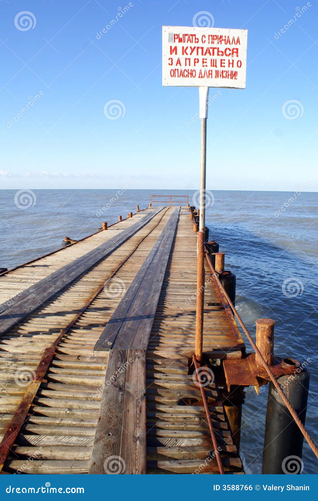 Sign on the pier stock photo. Image of activity, liquid - 3588766